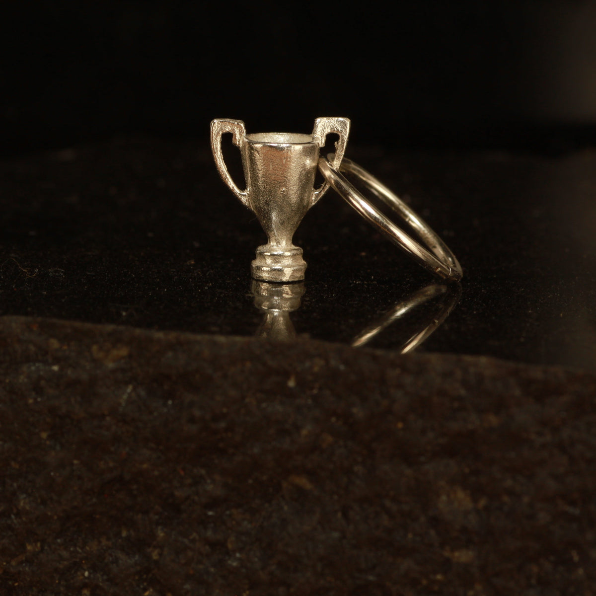 Tiny trophy earring – bonus prize